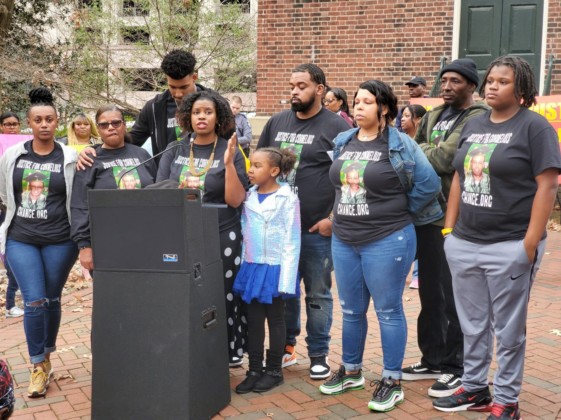 Prison reform advocates read inmate letters at State Capitol rally